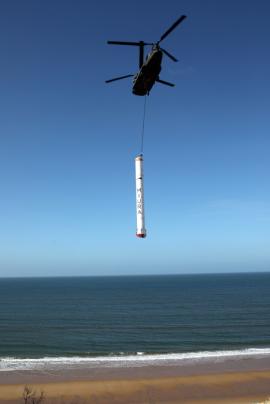 A Chinook rises to 17,000 ft to cooperate in an aerospace test ...